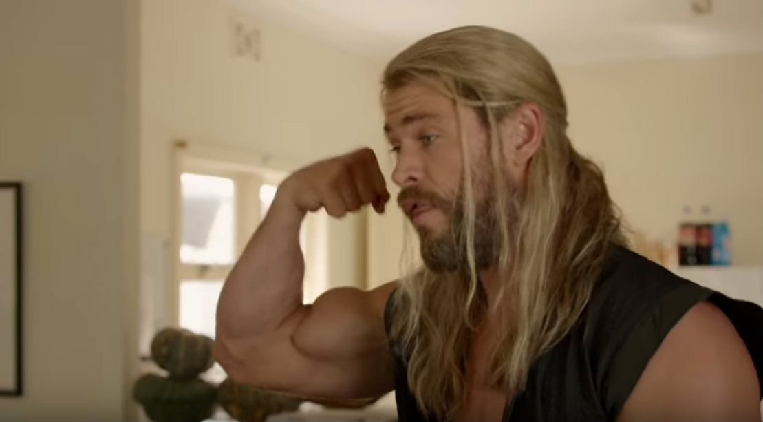 Chris Hemsworth Flexing Biceps