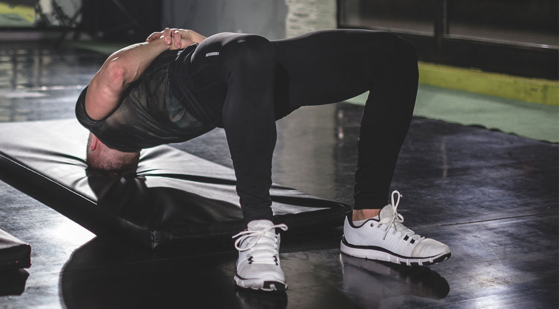 Neck bridge Exercise Video Guide | Muscle & Fitness