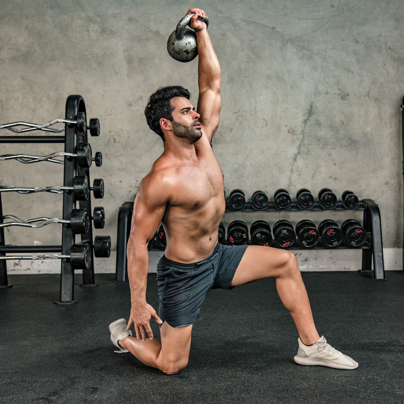 Kettlebell Turkish Getup Exercise Video Guide | Muscle & Fitness