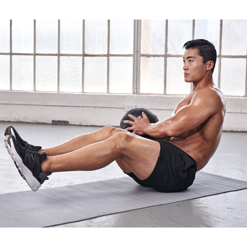 Medicine Ball V-Sit and Twist Exercise Video Guide | Muscle & Fitness