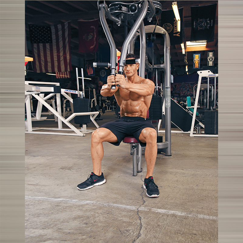 Machine Pec Flye Exercise Video Guide | Muscle & Fitness