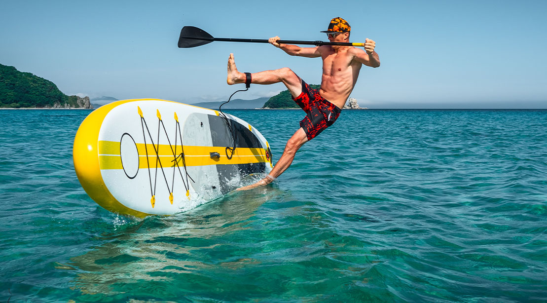 How to Stand-Up Paddleboard Like a Water Warrior - EMS Fitness Studio ...
