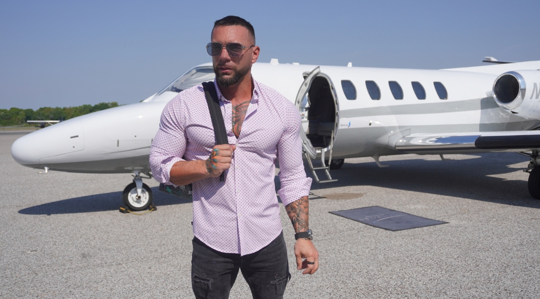 Check out The Rock Doing Dumbbell Shrugs - Muscle & Fitness